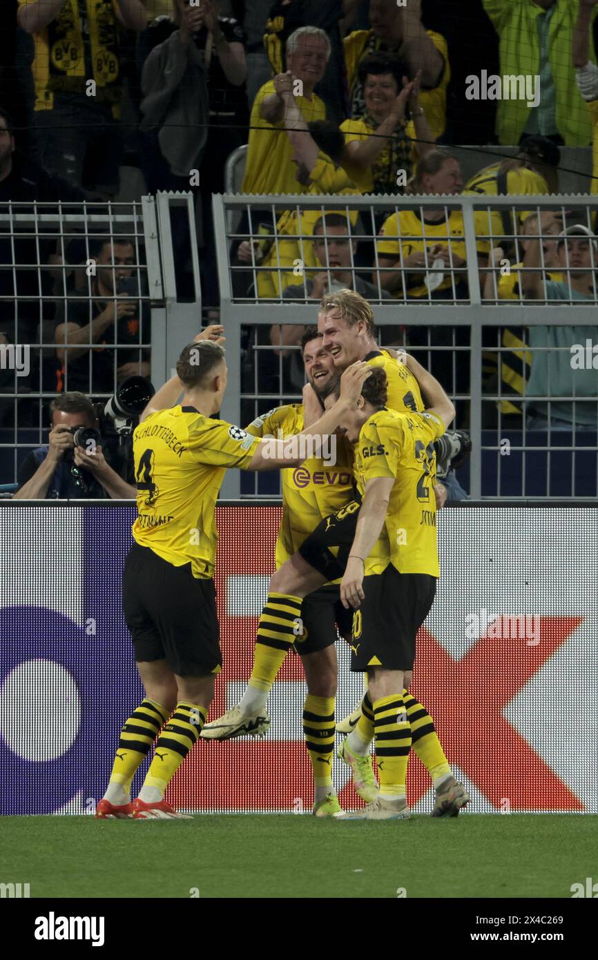 Niclas Fullkrug of Dortmund celebrates his goal with Julian Brandt and ...