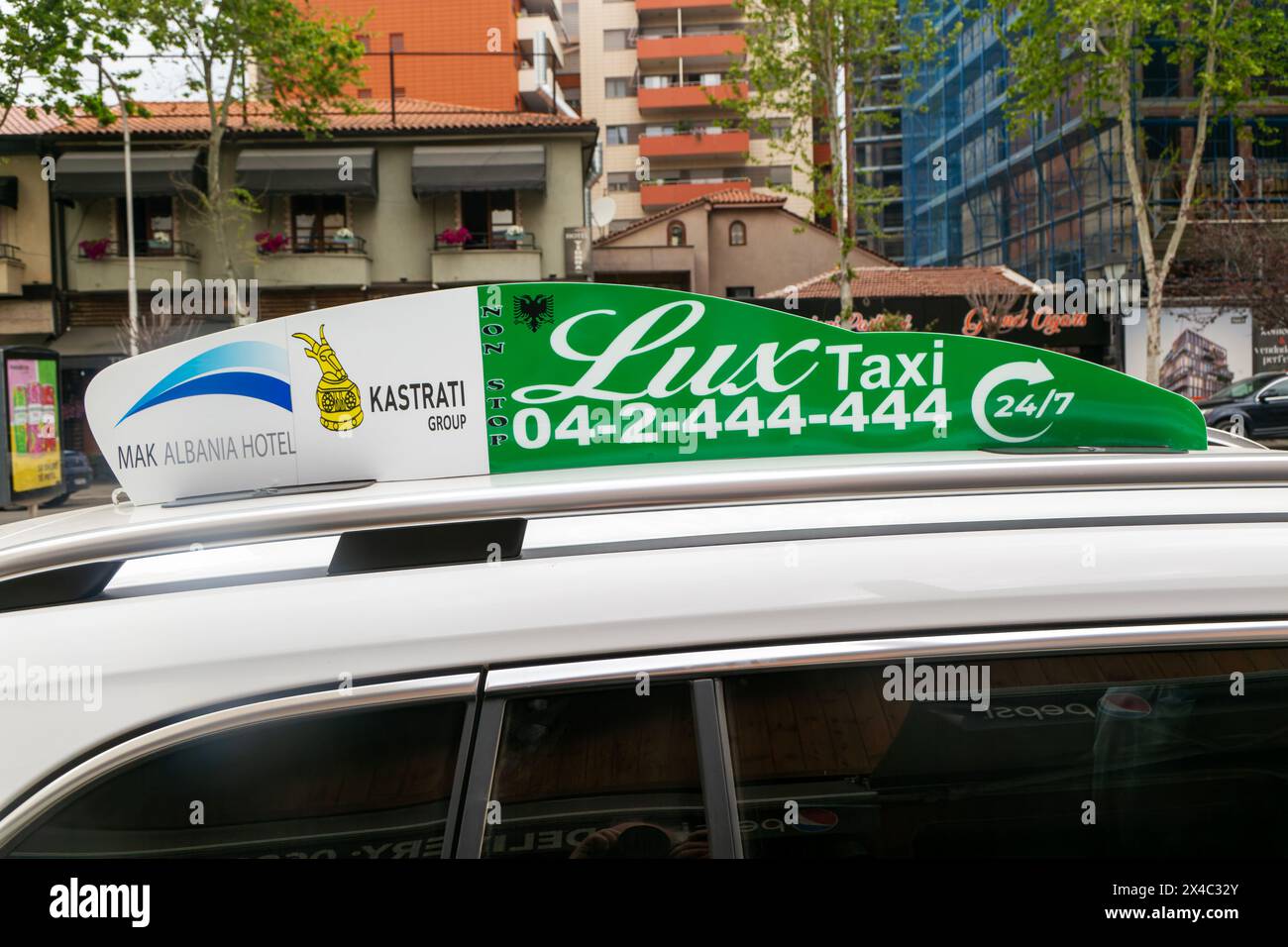 Detail of name and phone number of taxi vehicle car roof, Lux Taxi ...