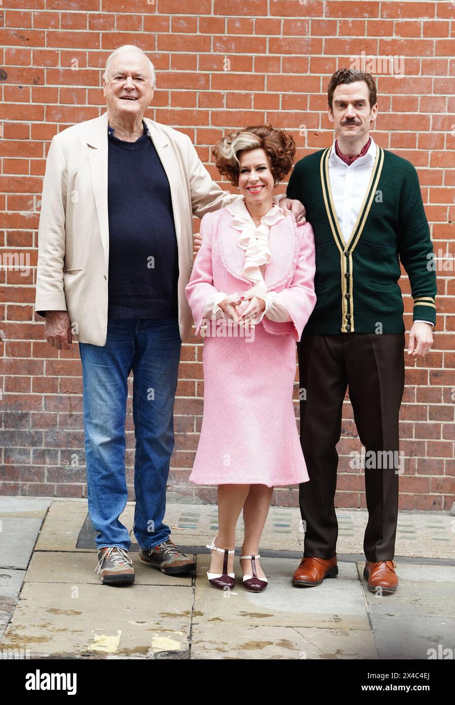 John Cleese with Anna-Jane Casye as Sybil, and Adam Jackson-Smith as ...