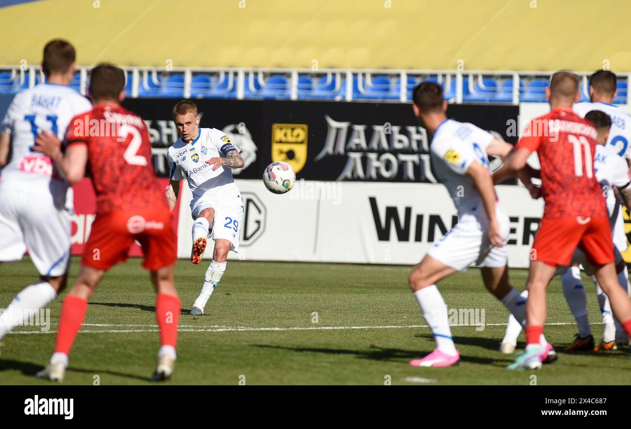 KYIV, UKRAINE - MAY 1, 2024 - Players of FC Dynamo Kyiv (white kit) and ...