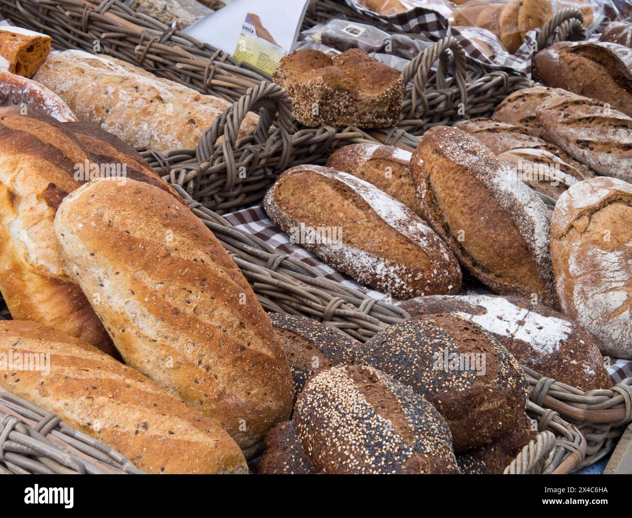 A variety of breads in baskets at a market in the town of Alkmaar Stock ...