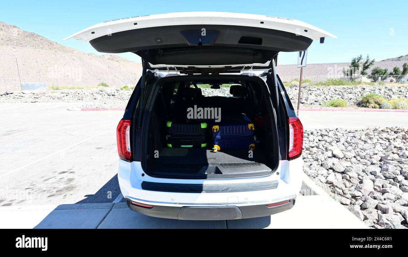 Open Tailgate with luggage on an American SUV Stock Photo - Alamy