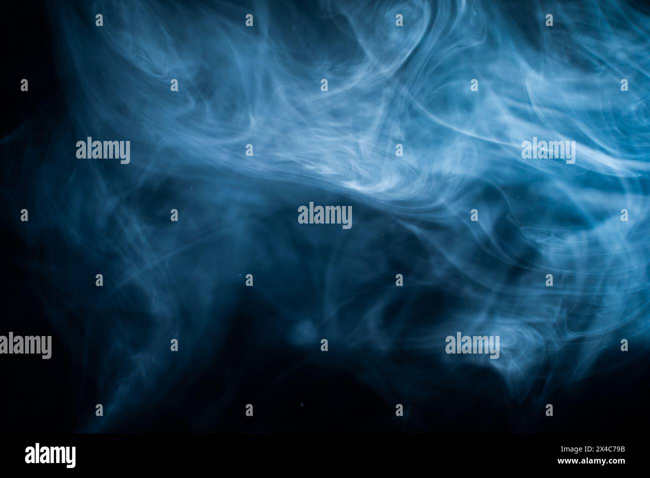 Smoke cloud on dark Background. Blue fog haze Stock Photo - Alamy
