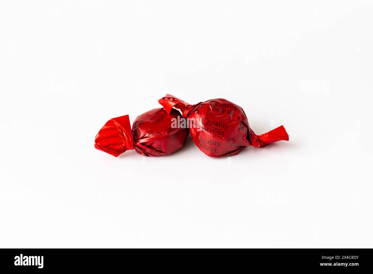 Two strawberry flavour Quality Street Sweets in the new recyclable ...