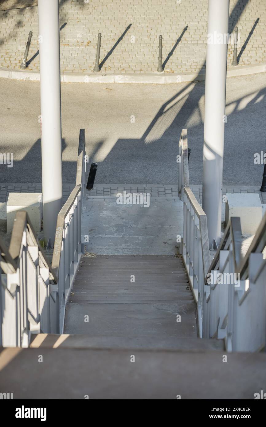 Terracotta stairs with gray railings in an outdoor structure Stock ...