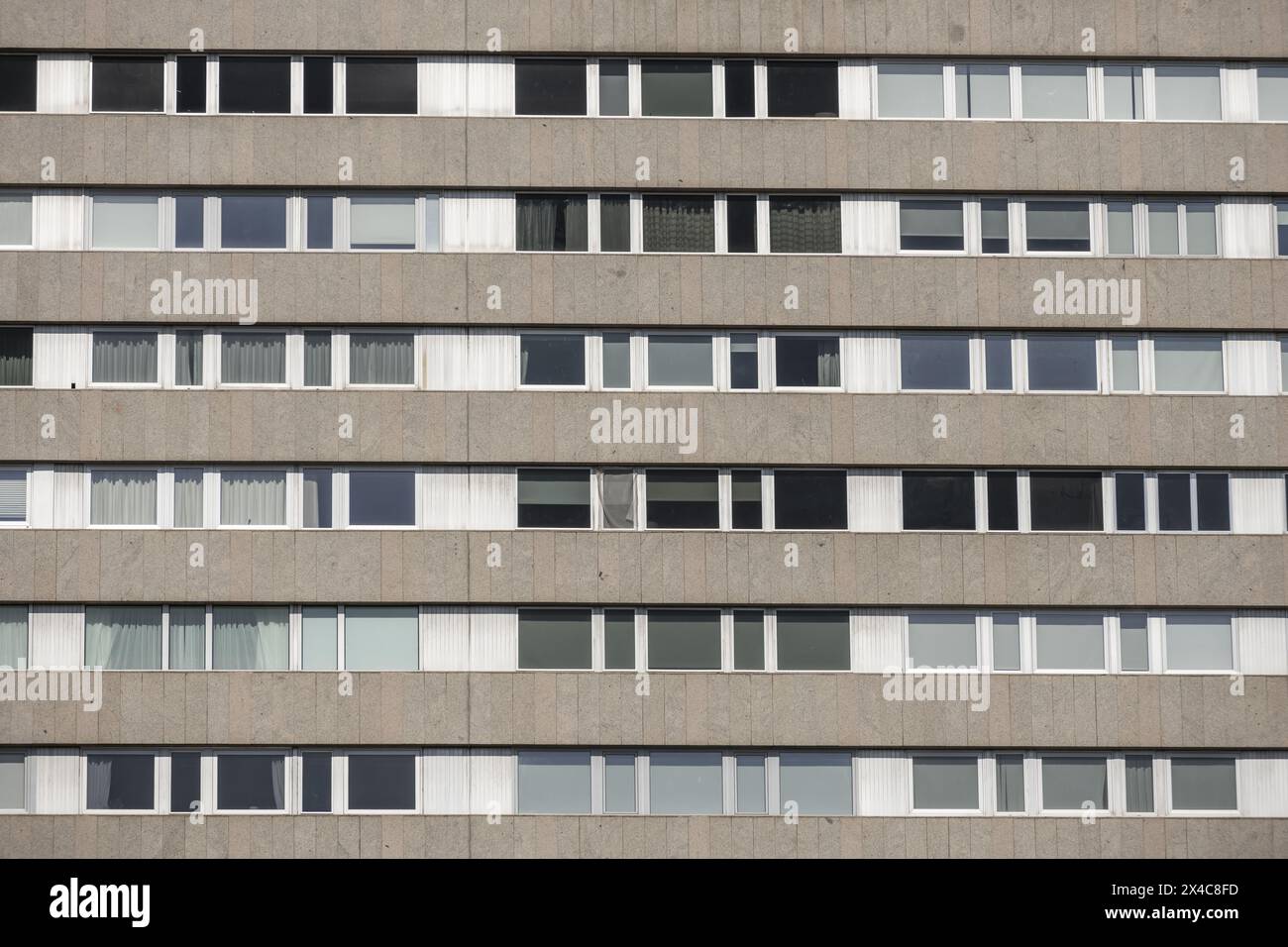 facade with granite cladding and a multitude of similar windows Stock ...