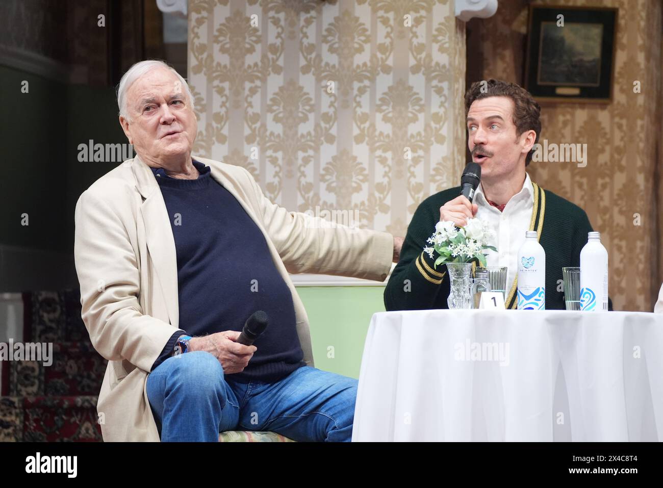 John Cleese and Adam Jackson-Smith as Basil Fawlty during a Q&A session ...