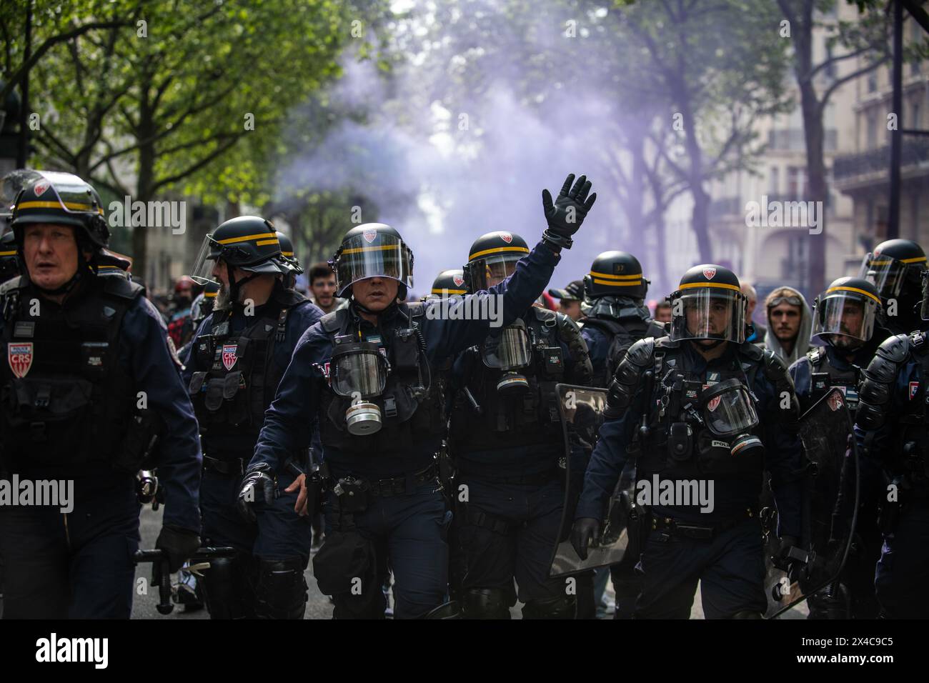 May 1st 2024, Paris, France. Riot police march ahead of protesters as ...
