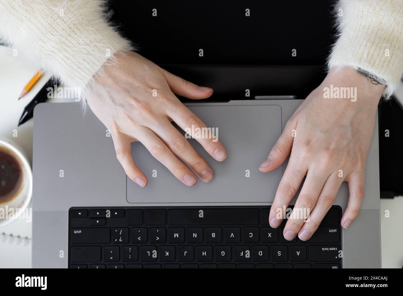 Hands typing laptop keyboard top hi-res stock photography and images ...