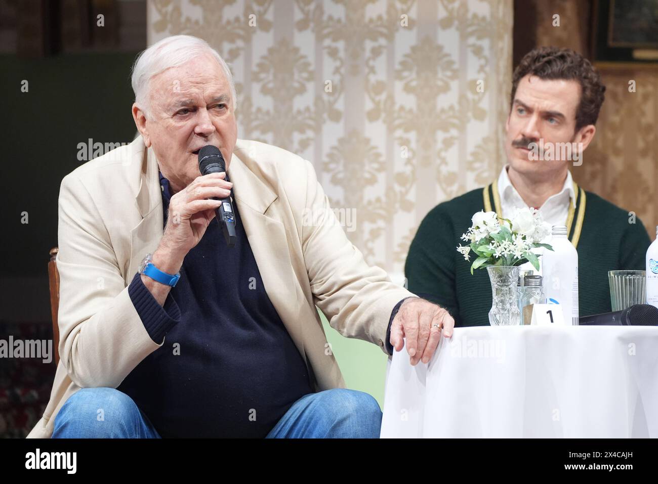 John Cleese and Adam Jackson-Smith as Basil Fawlty during a Q&A session ...