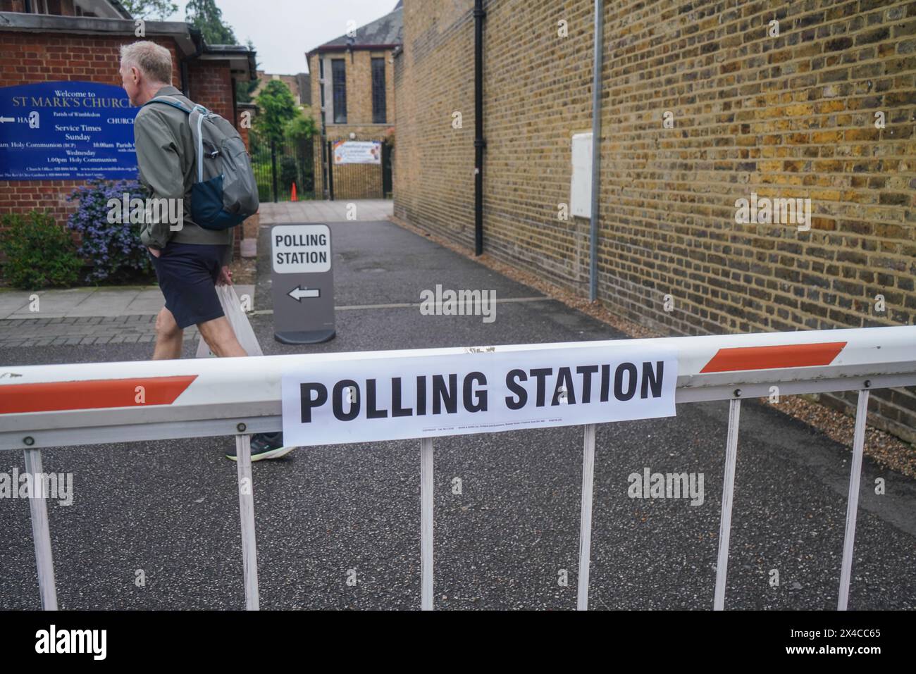 London, UK. 2 May, 2024. A voter enters St Mark's Hall church in ...