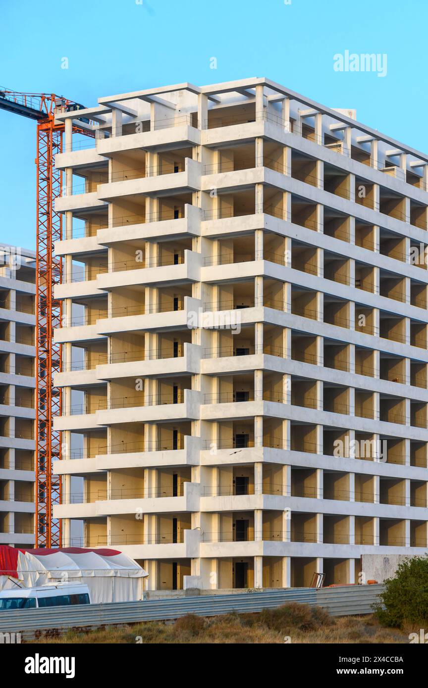 Tower cranes on the construction site of a block of flats of the ...