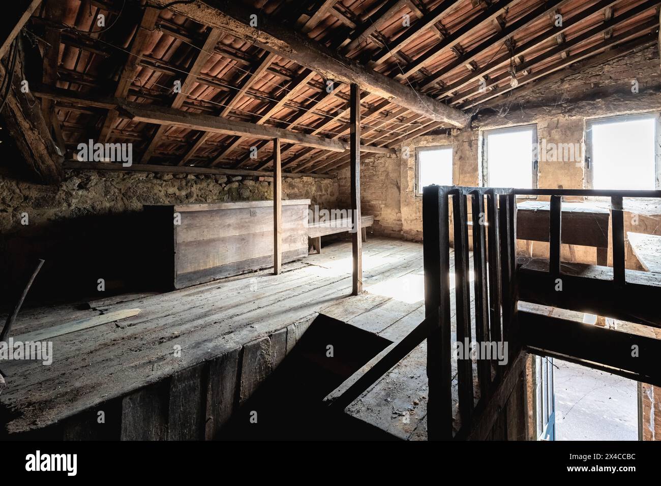 interior of an old abandoned stone house typical of northern portugal ...