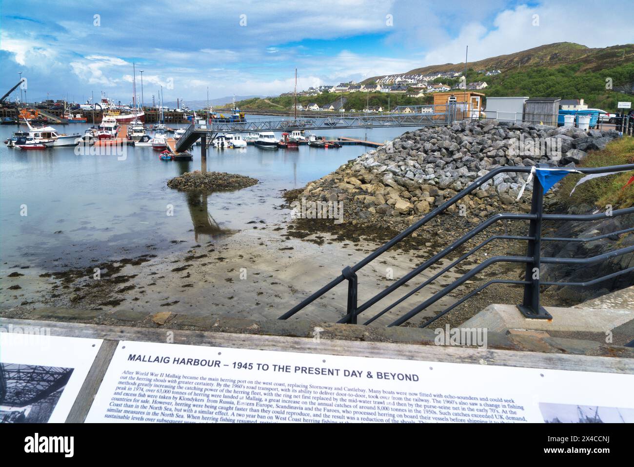 Looking north west to Mallaig harbour at Mallaig Pier. Western ...