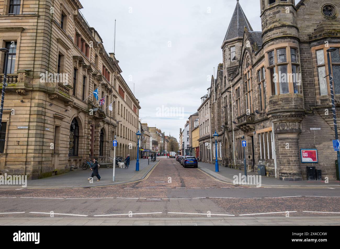 Typical Scottish local granite stone buildings at the corner of high ...