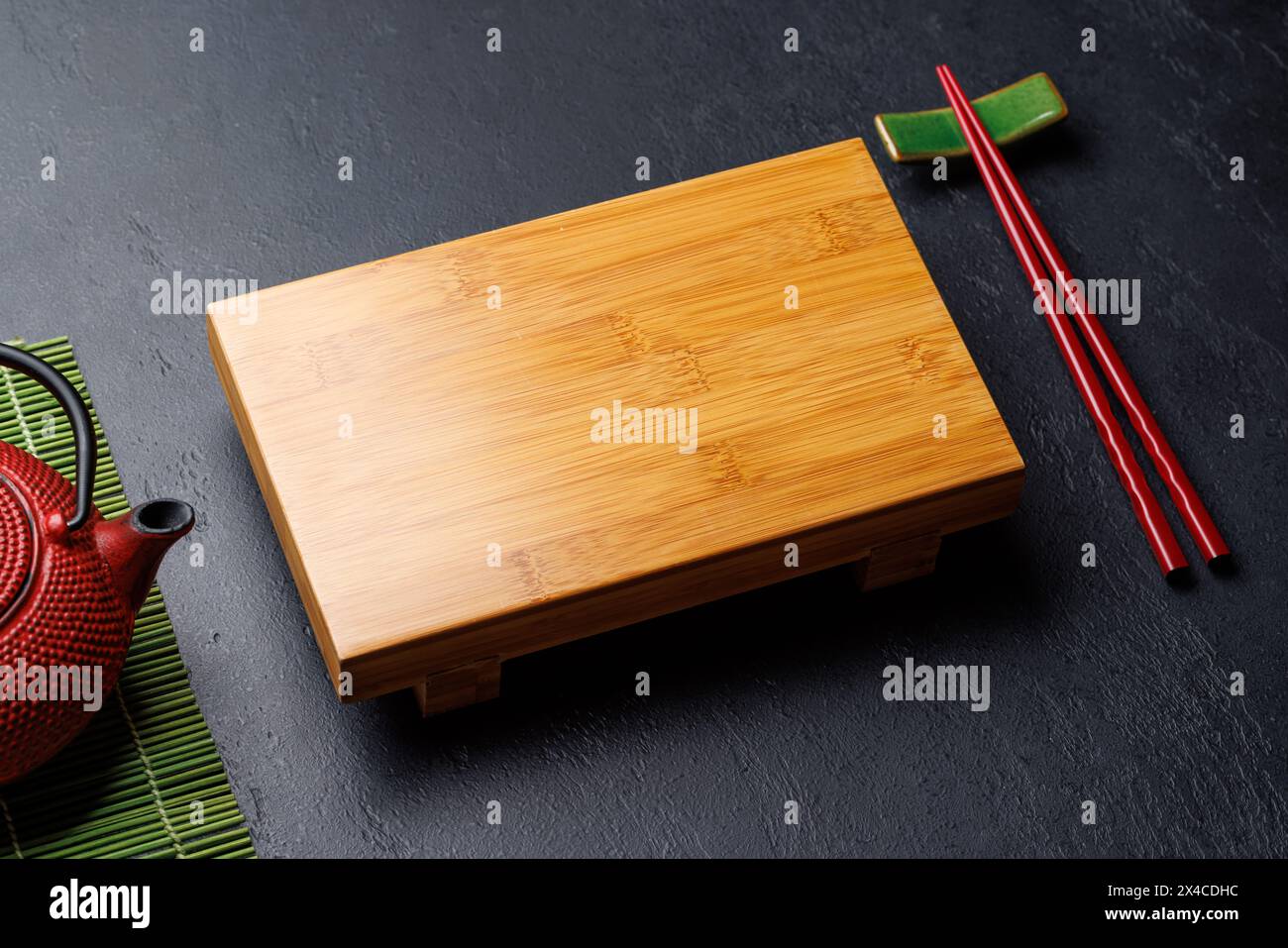 Japanese Table Setting with Wooden Board, Teapot, Chopsticks Stock ...