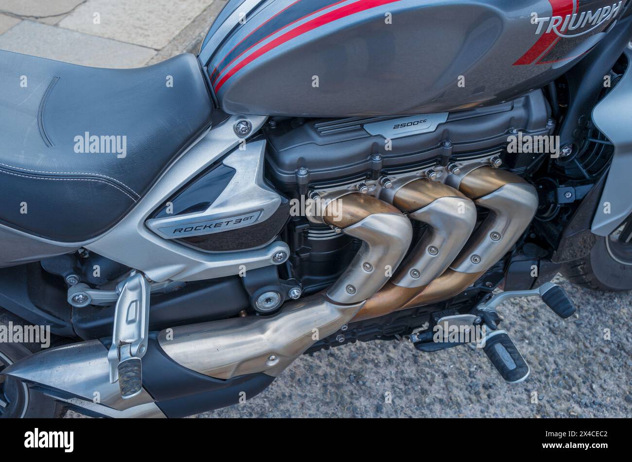 The engine and exhaust of a Triumph Rocket 3 gt motorbike Stock Photo ...