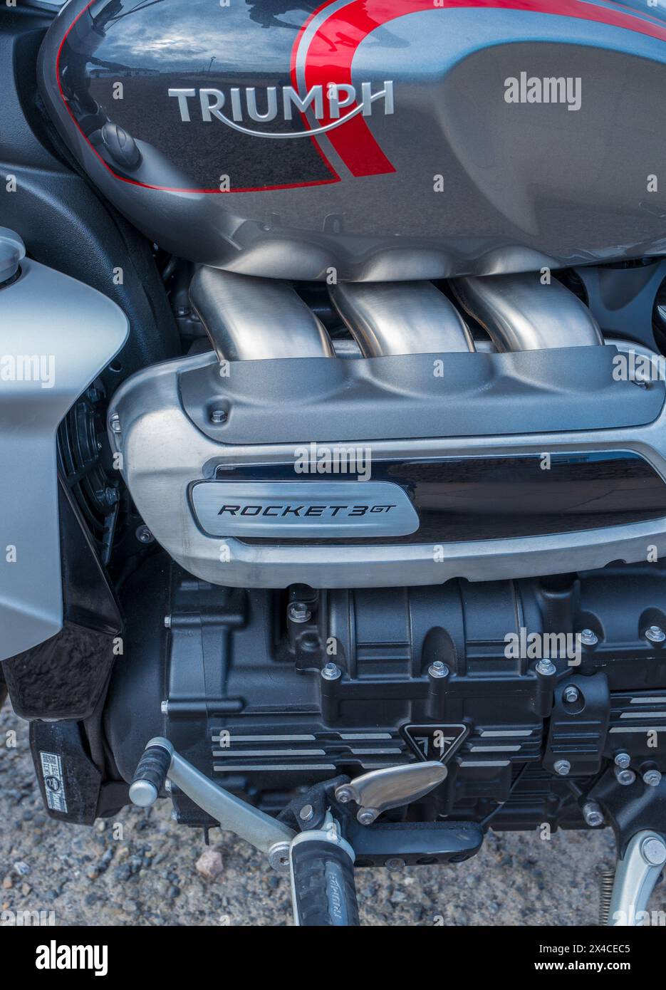 The engine and exhaust of a Triumph Rocket 3 gt motorbike Stock Photo ...