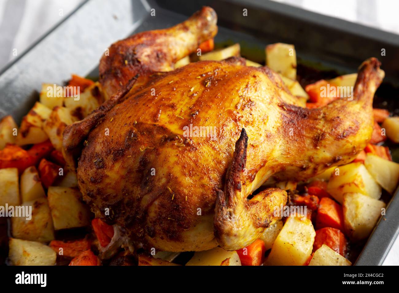 Homemade Hearty Roasted Chicken on a Tray, side view Stock Photo - Alamy