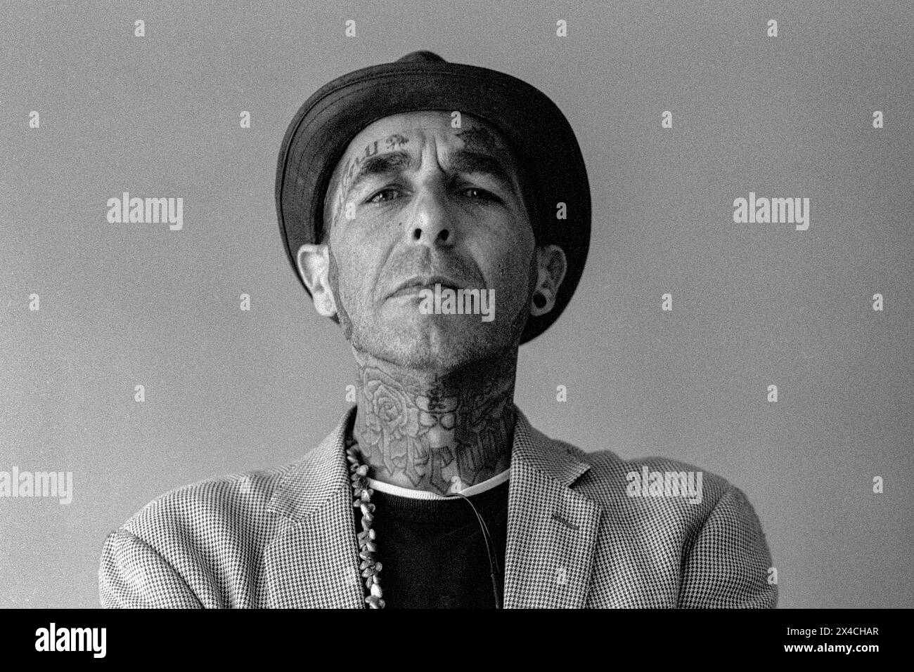 Portrait Artist Dave Plu Portrait of artist Dave Plu inside studio ...