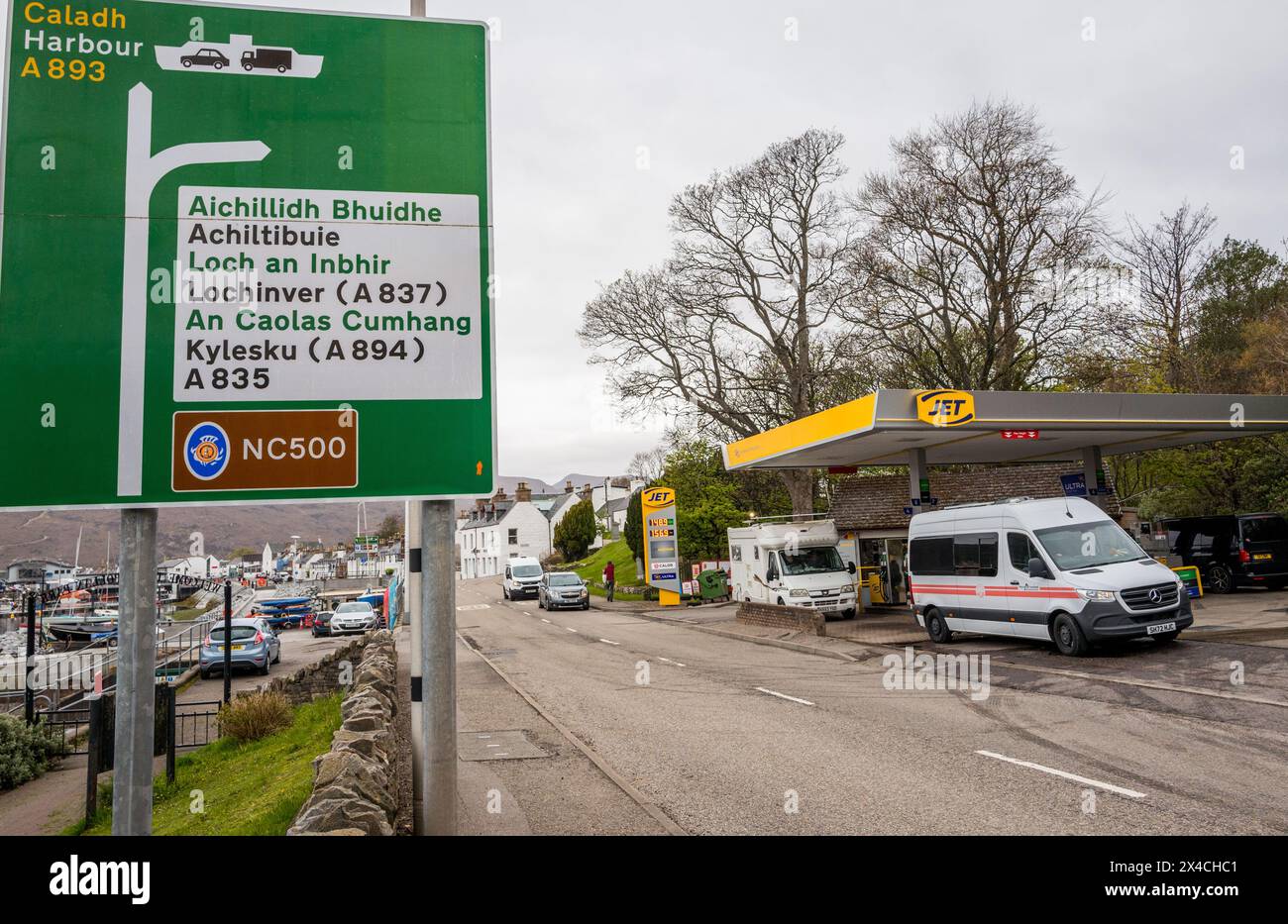 Road direction sign showing the NC500 in the Scottish fishing town of ...