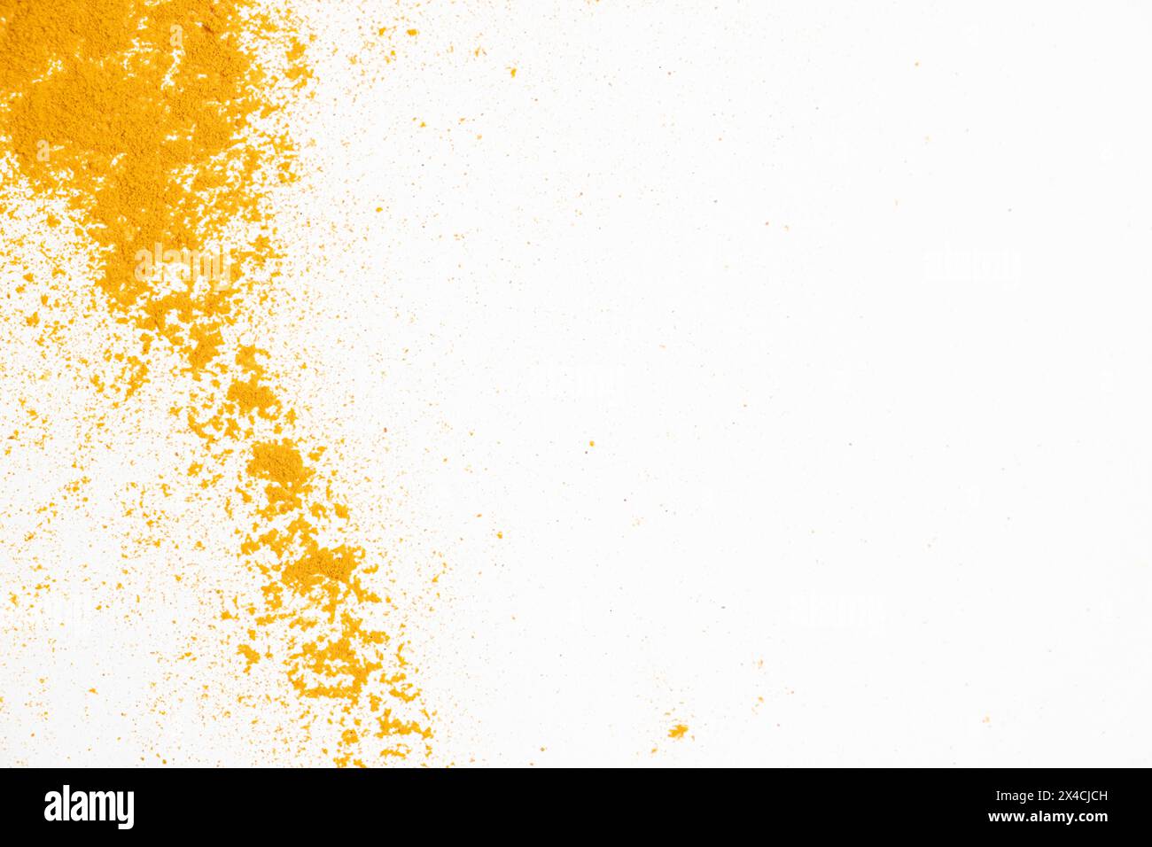 Scattered turmeric powder on white background, turmeric pattern and ...