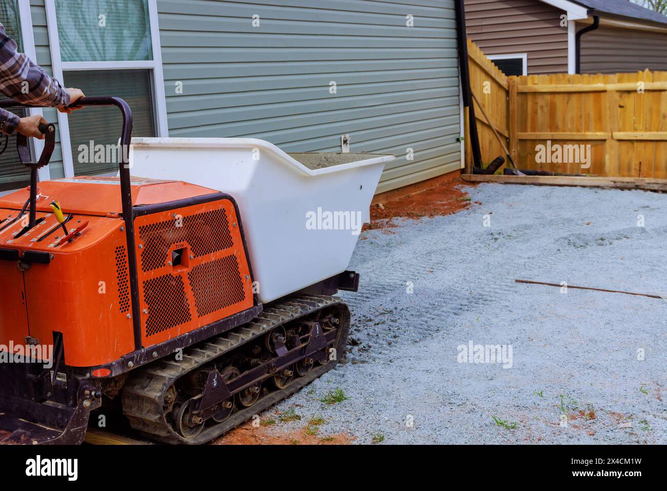 Self dumping rubber track concrete hi-res stock photography and images ...