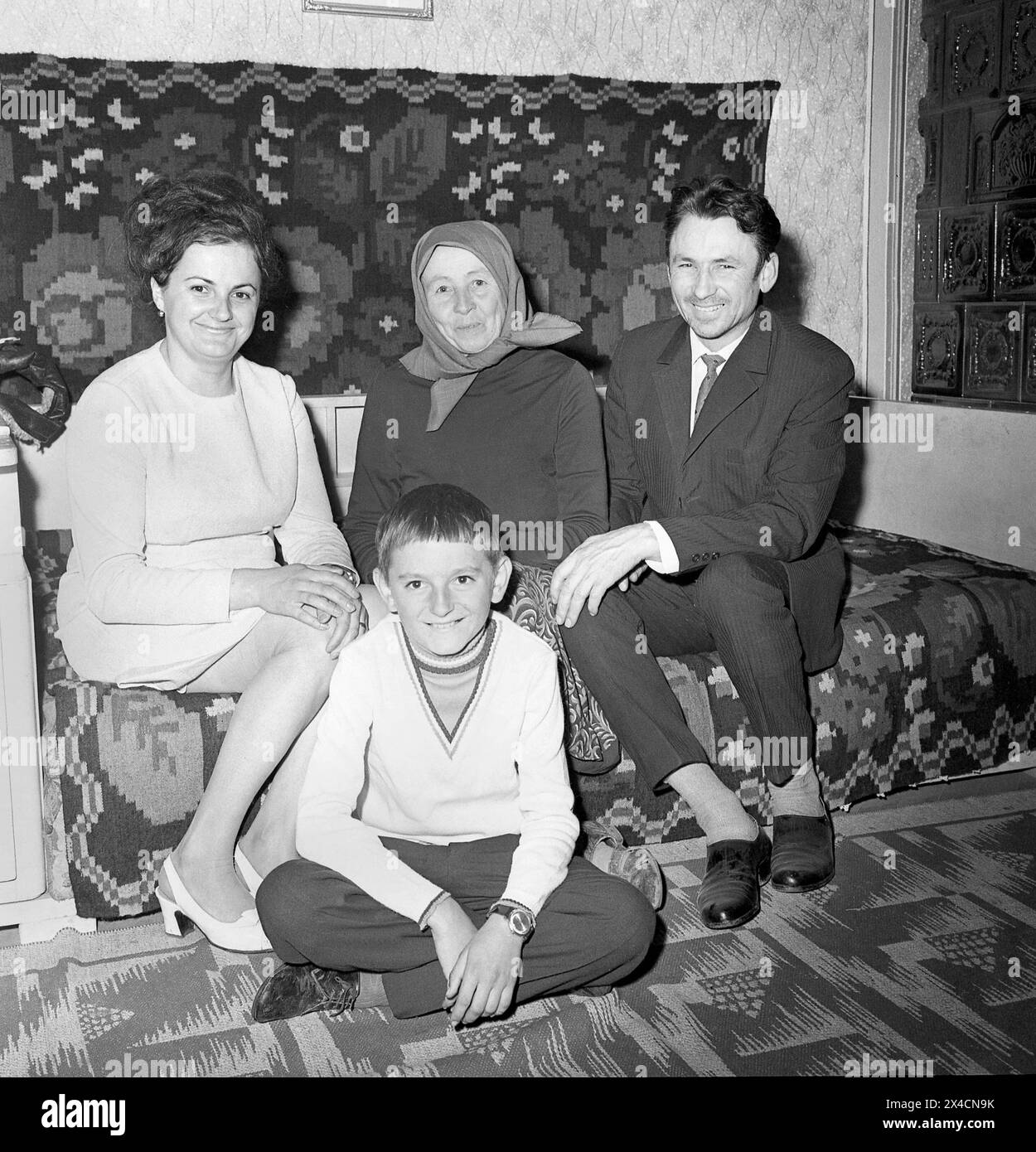 Socialist Republic of Romania in the 1970s. Parents with child posing ...