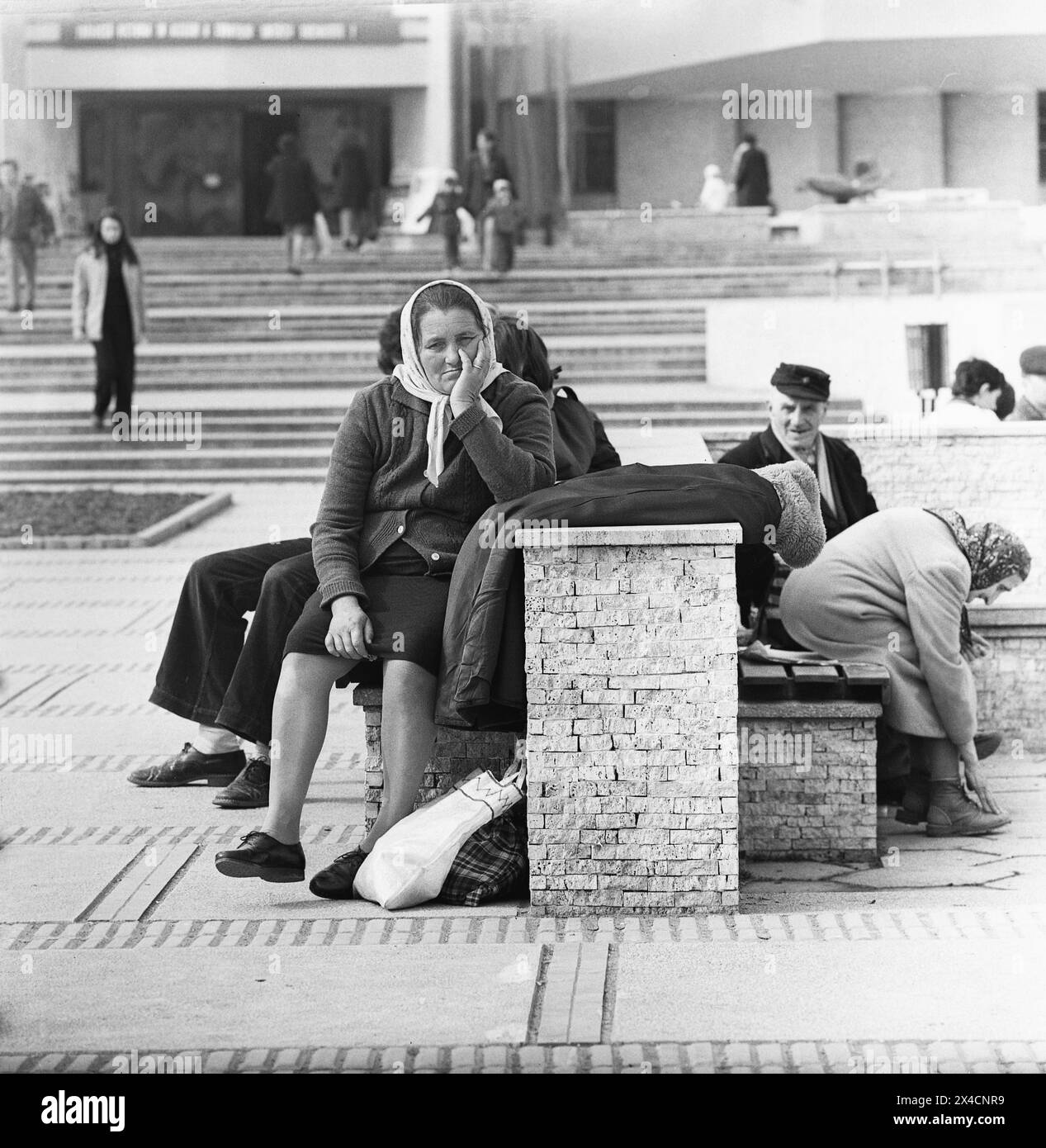 Socialist Republic of Romania in the 1970s. People in a city square ...