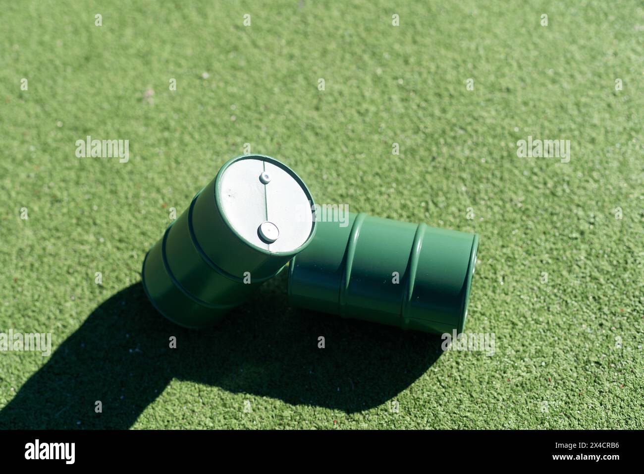toy oil barrel on a natural background Stock Photo - Alamy