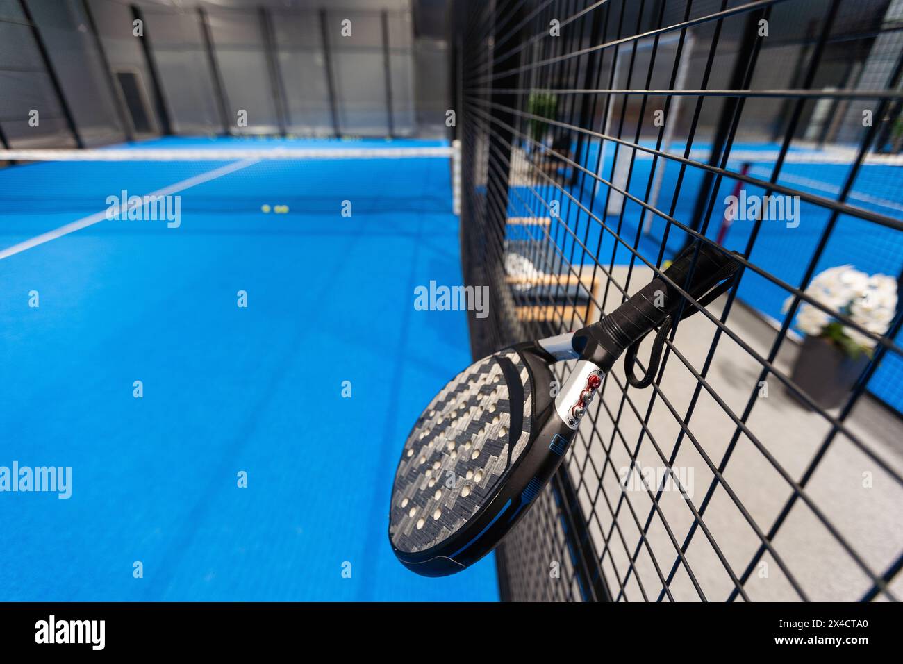 paddle tennis racket and balls on court Stock Photo - Alamy