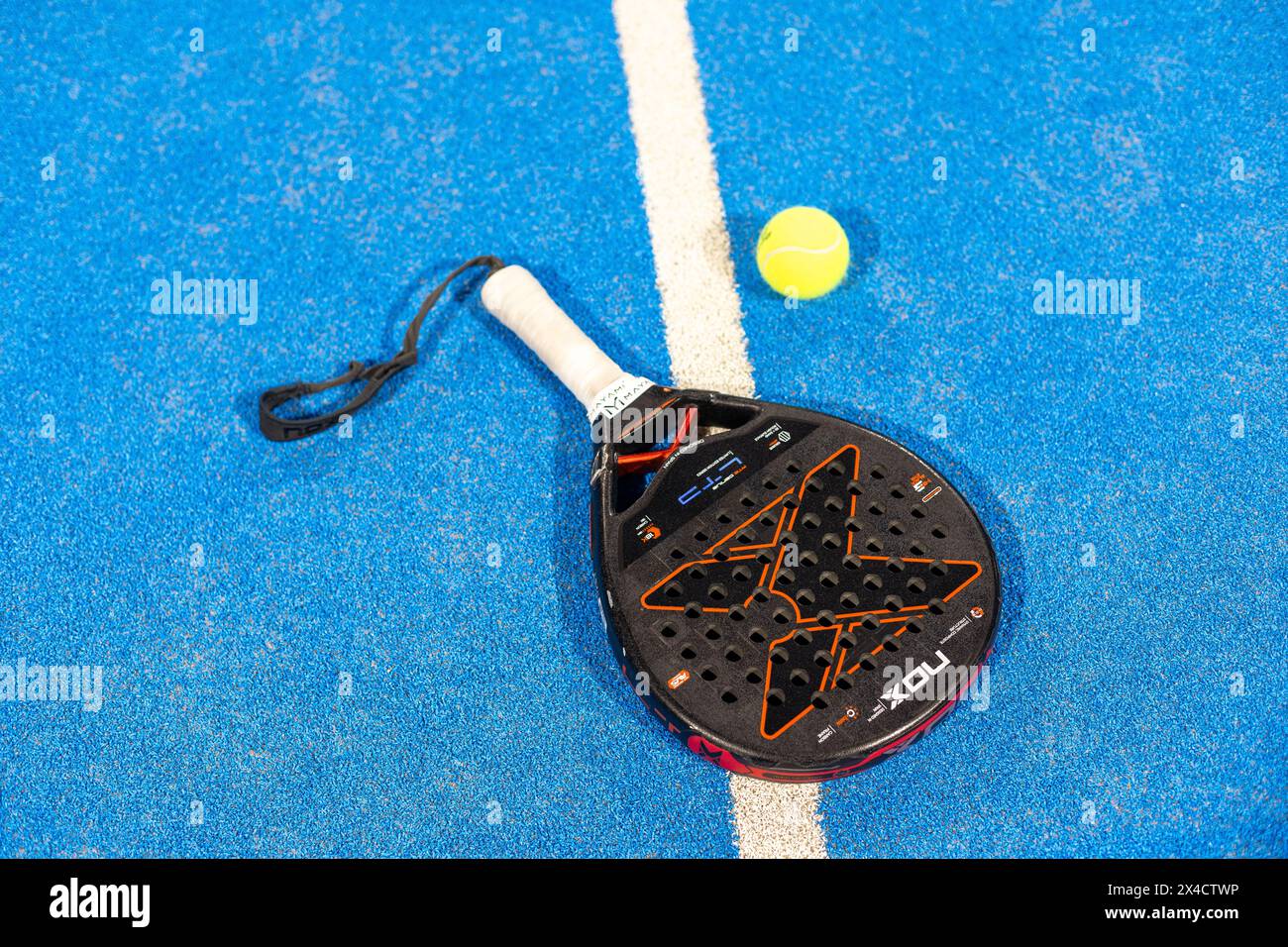Kyiv, Ukraine, April 18, 2024. Black professional paddle tennis racket ...