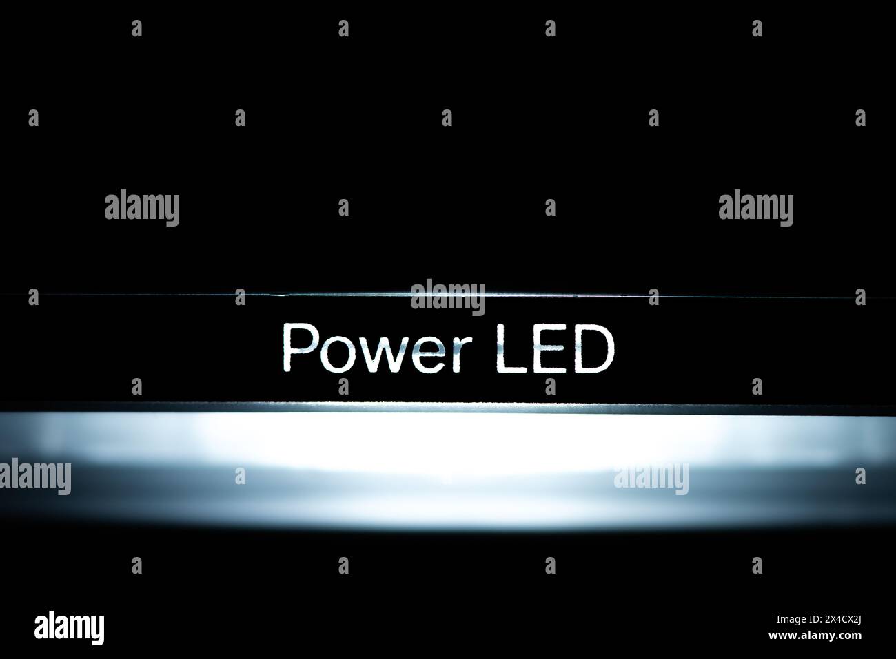 A striking display of 'LED power' written in bright white light ...