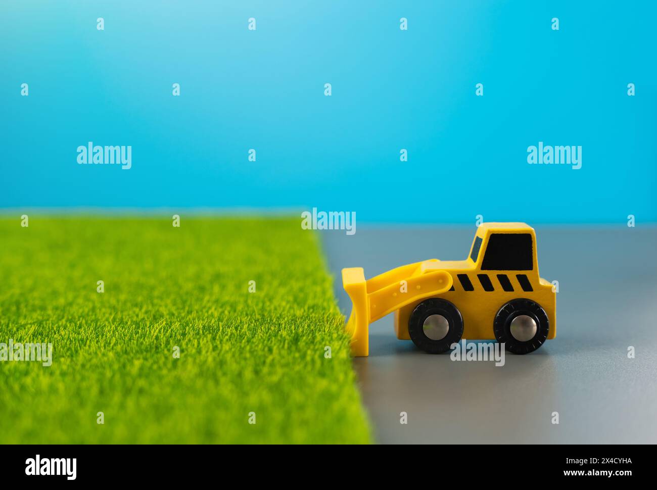 Bulldozer clears fertile land for construction. Preservation of natural ...