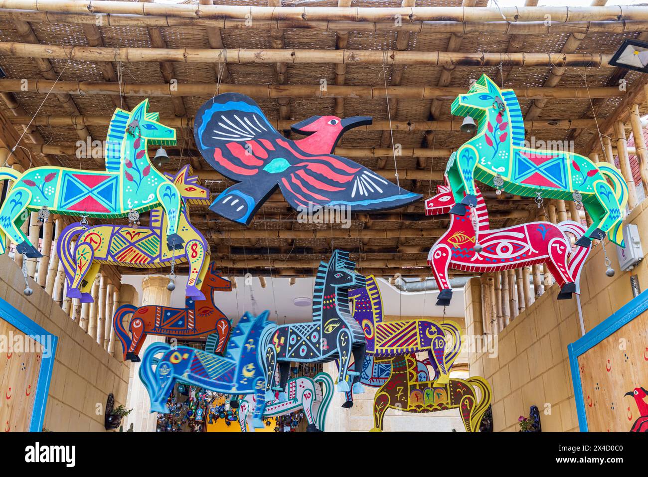 Faiyum, Egypt. Wooden painted horses and birds. (Editorial Use Only ...