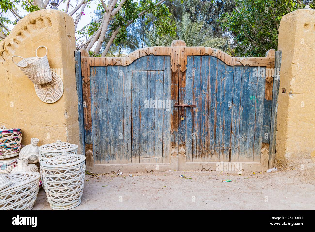 Faiyum, Egypt. Blue painted wooden gate in a wall Stock Photo - Alamy