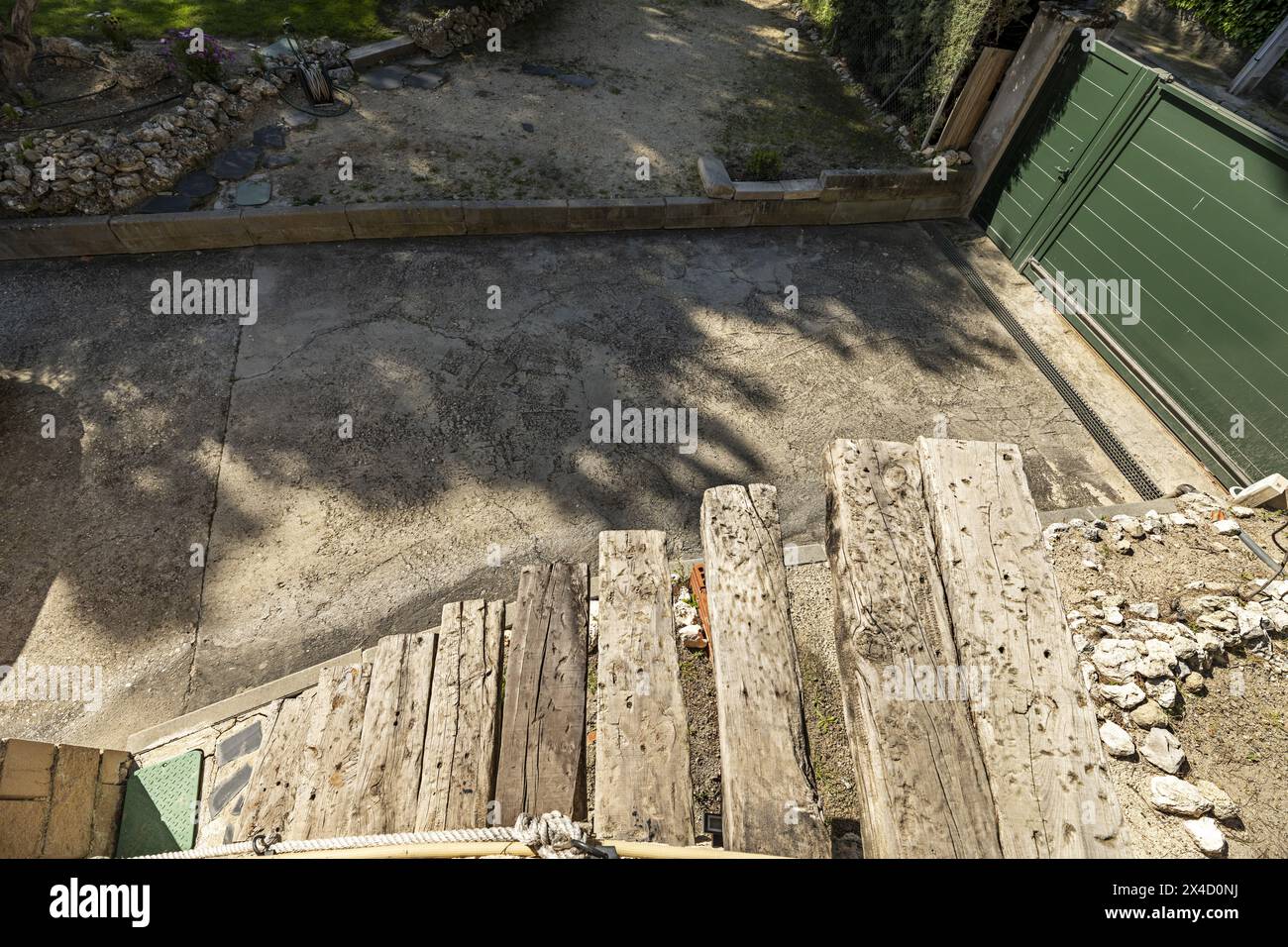 Exterior stairs of a detached house with wooden sleepers integrated ...