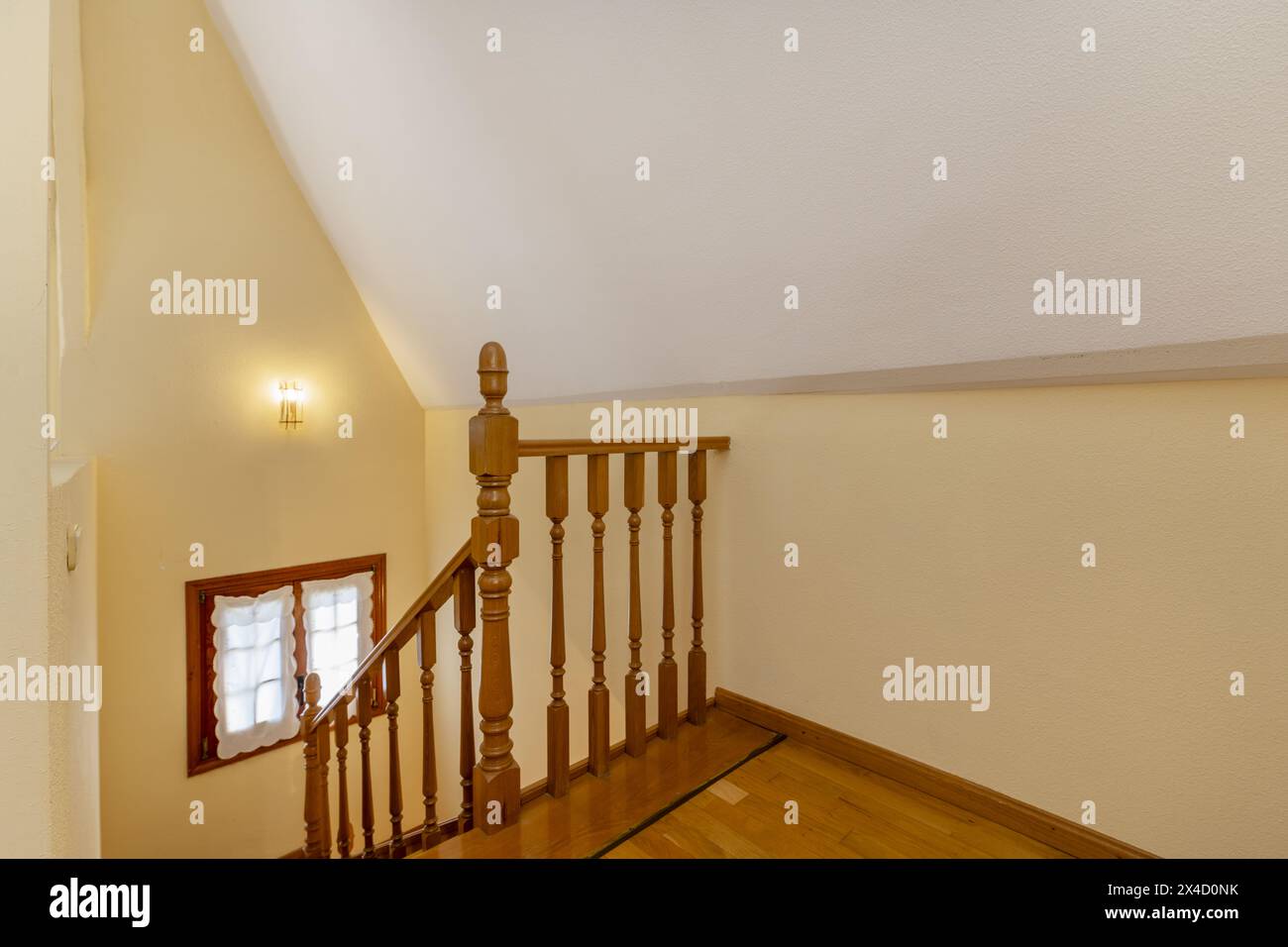 Interior staircase of a single-family home with access to an attic room ...