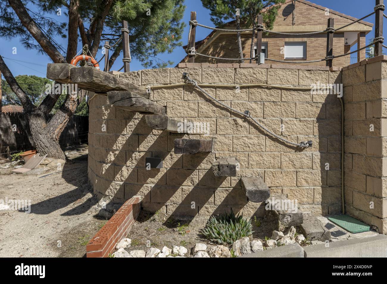 Exterior stairs of a detached house with wooden sleepers integrated ...