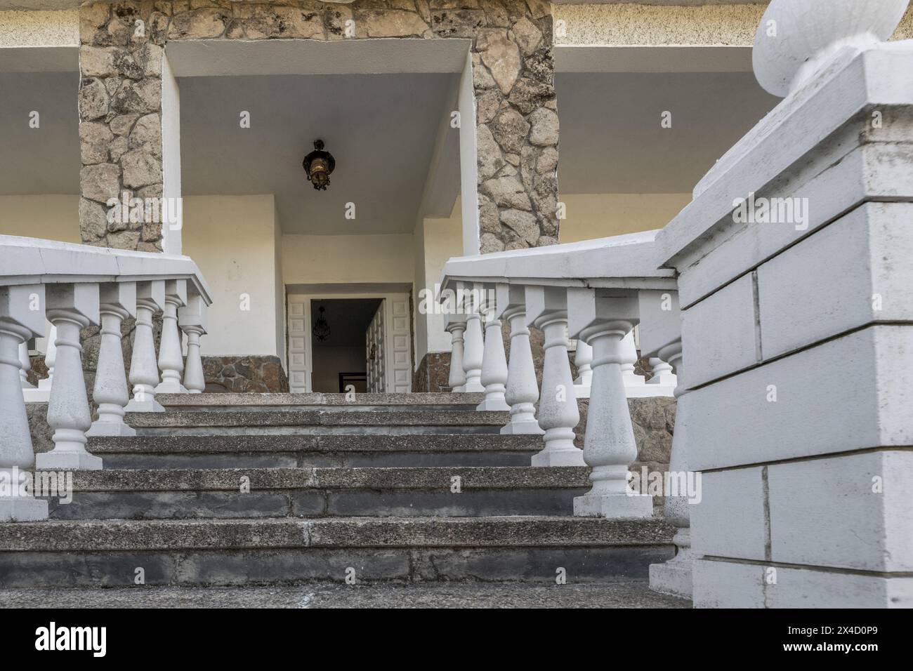Exterior stairs of a single-family home with prefabricated white ...