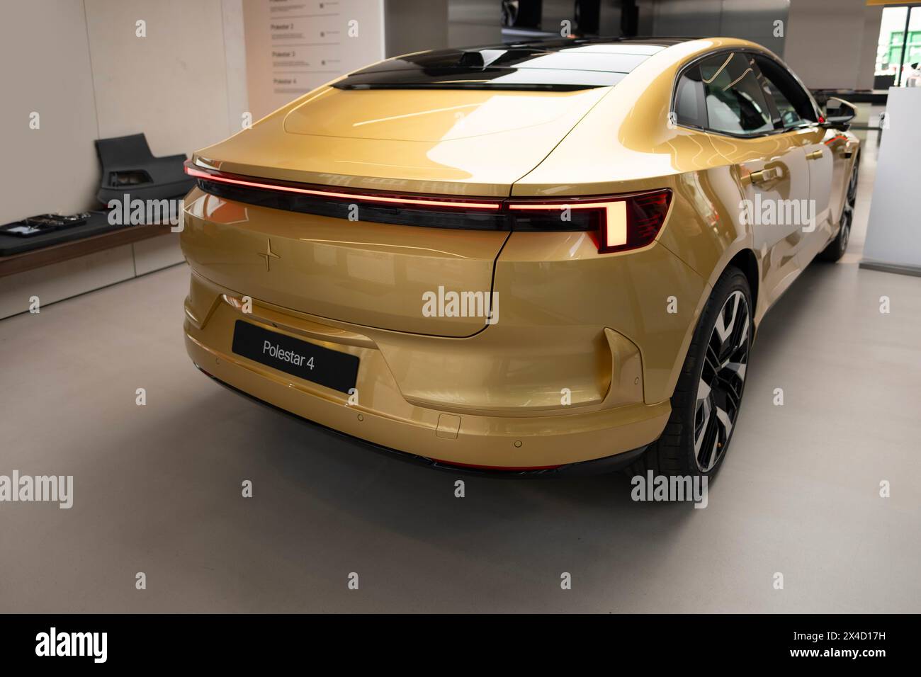 Shiny golden car Polestar 4 upcoming all-electric SUV coupe by Polestar ...