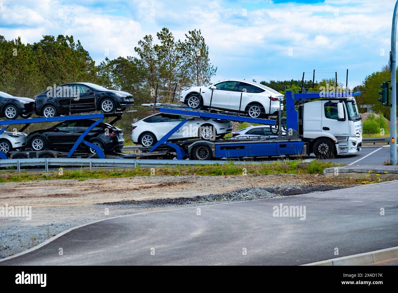 car transporter carrier transports new Tesla vehicles from Gigafactory ...