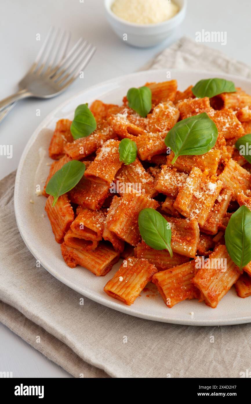 Homemade Vodka Rigatoni Pasta with Parmesan Cheese and Basil, side view ...