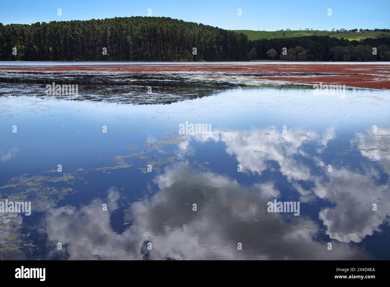 Landscape with a lake, sky and clouds reflection in the water on the ...