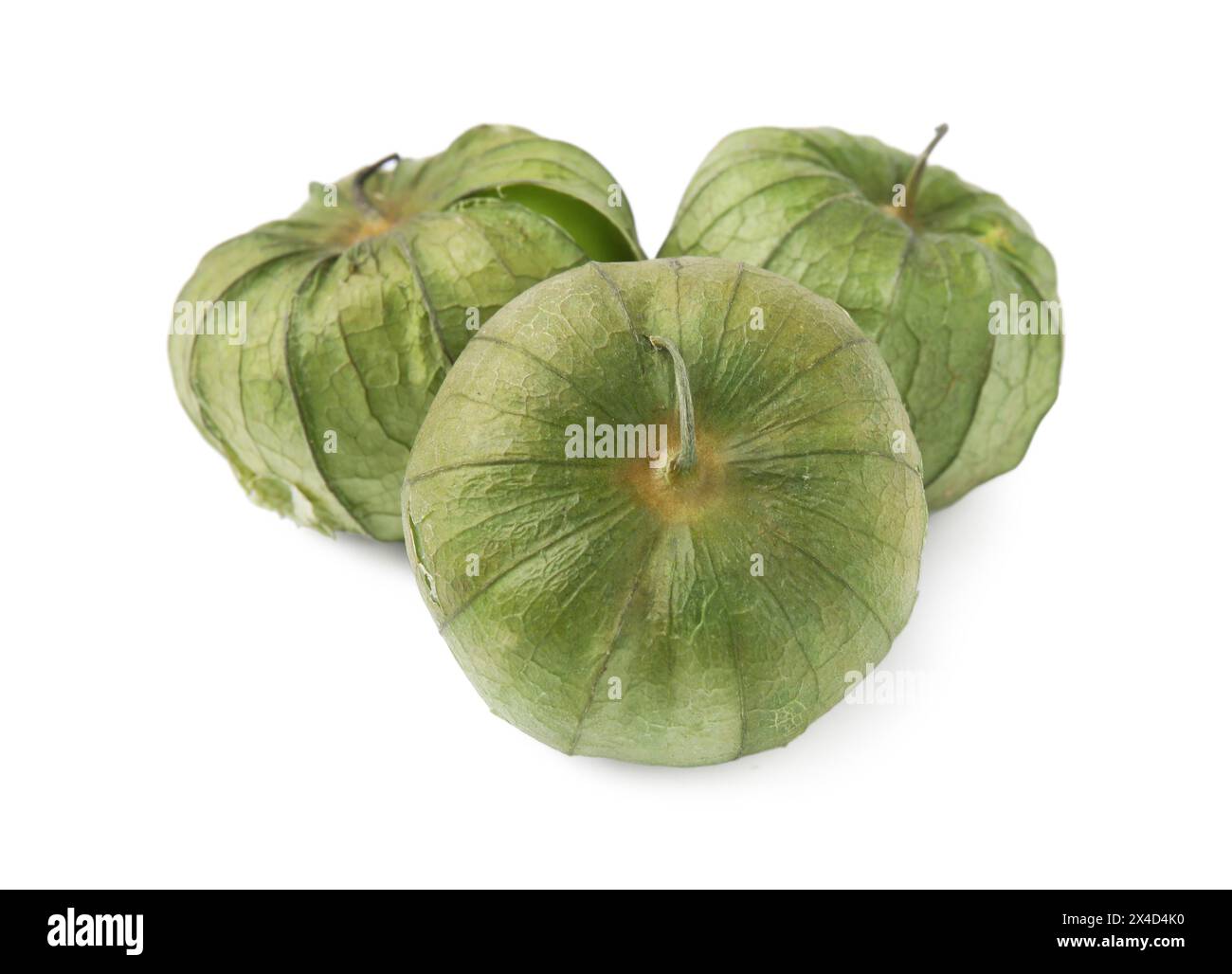 Fresh green tomatillos with husk isolated on white Stock Photo - Alamy