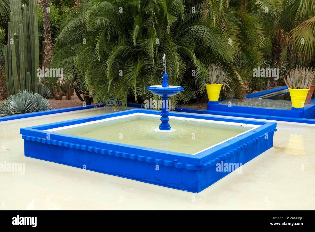 Marrakech, Morocco. Blue fountain in garden setting Stock Photo - Alamy