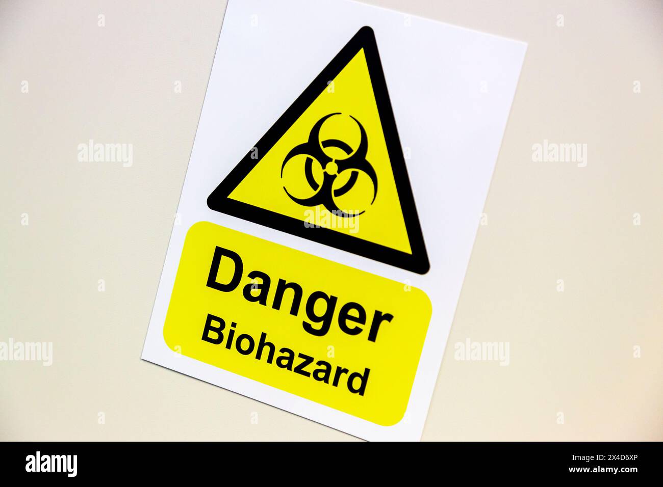 Danger Biohazard warning sign in a science laboratory Stock Photo - Alamy