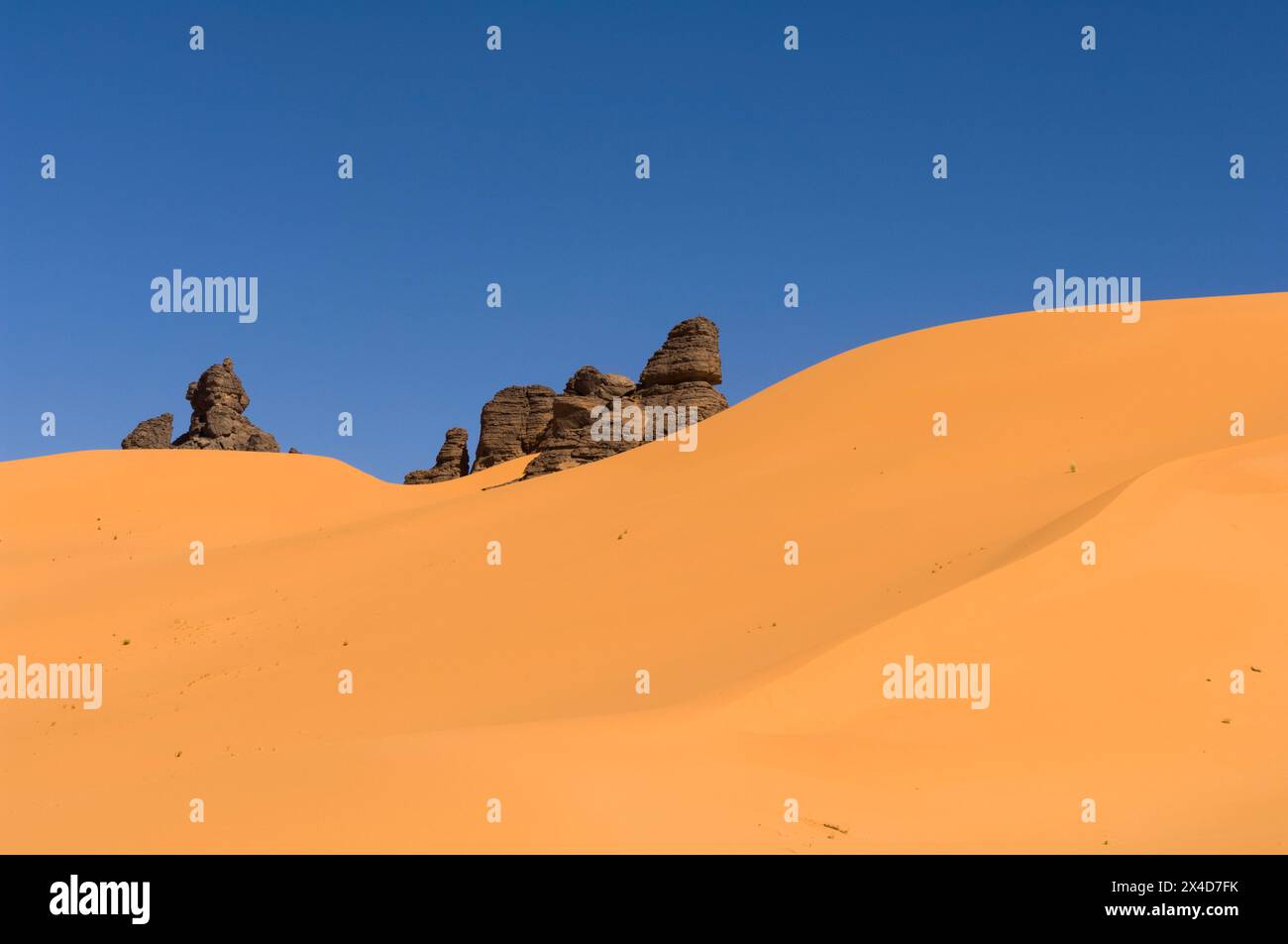 Rock formations and sand dunes in the Akakus, Fezzan, Libya Stock Photo ...