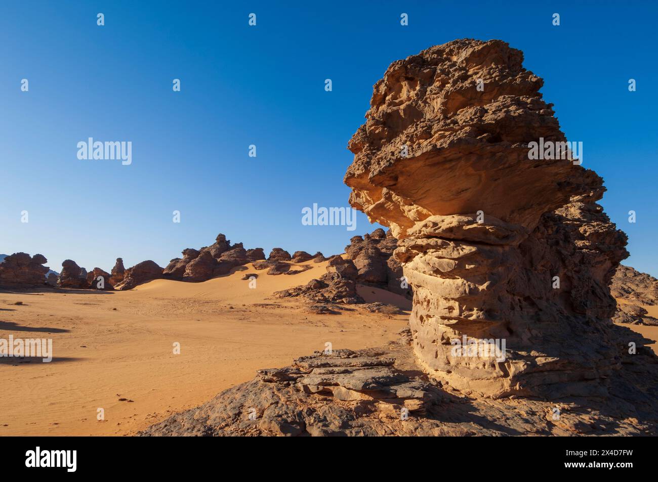 Rock formations and sand dunes in the Akakus, Fezzan, Libya Stock Photo ...
