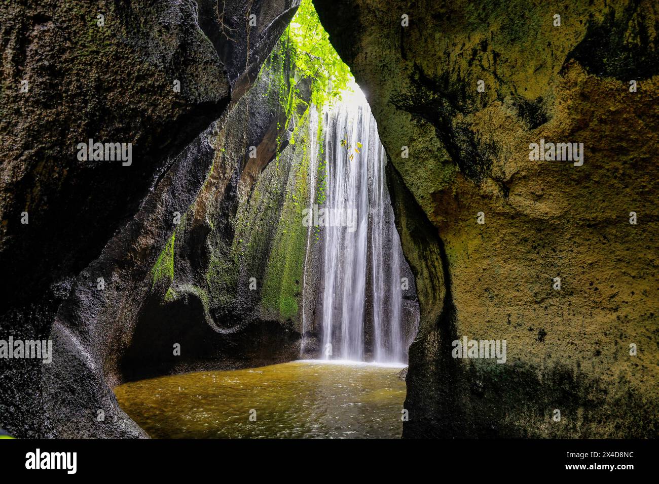 Tukad Cepung Waterfall in the central mountains of Bali, Indonesia ...